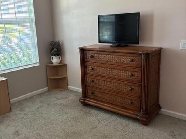 Live in Palm Bay in a Super Large 2 room mini suite with kitchenette