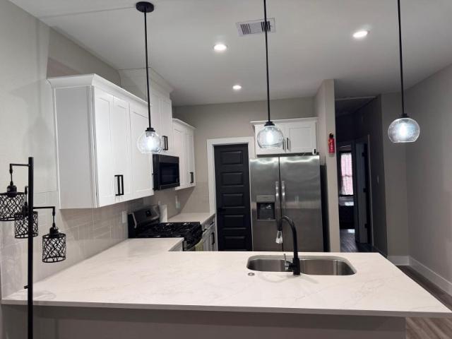 Live in South Side, a 4 minute walk to transit sto