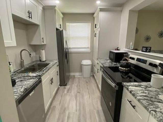 Live in Southeast Raleigh, a 4 minute walk to tran