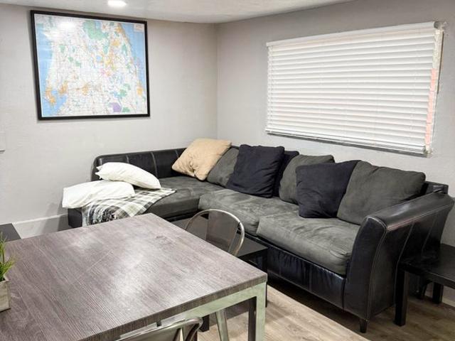 Live in Tampa Heights, a 2 minute walk to transit