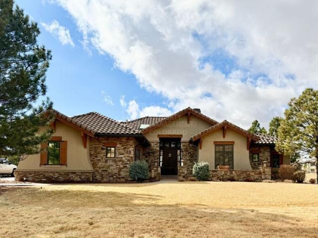 Located within the Exclusive Colorado Golf Club community