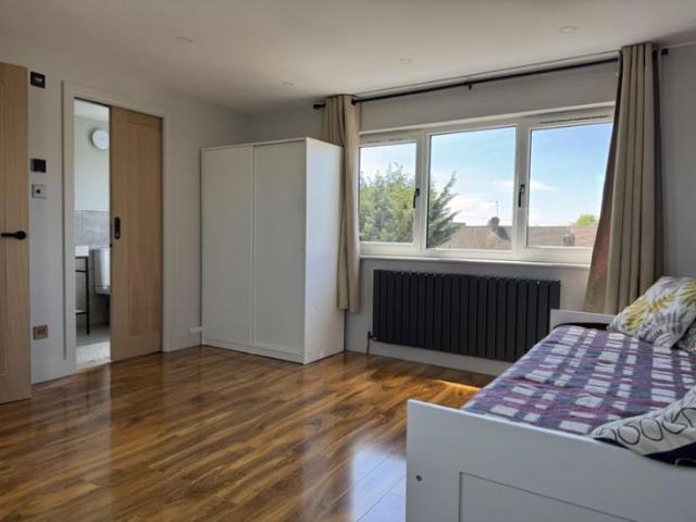 Loft conversion in newly refurbished home near Richmond Park