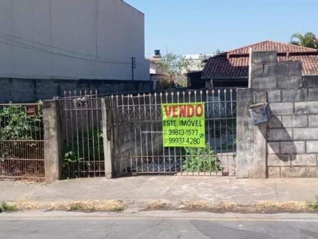 Lote com casa e barracão