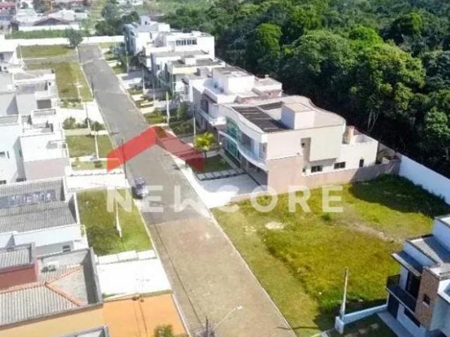 Lote em condomínio em Avenida Luciano de Bona Bougainville Residencial IV Peruíbe/SP