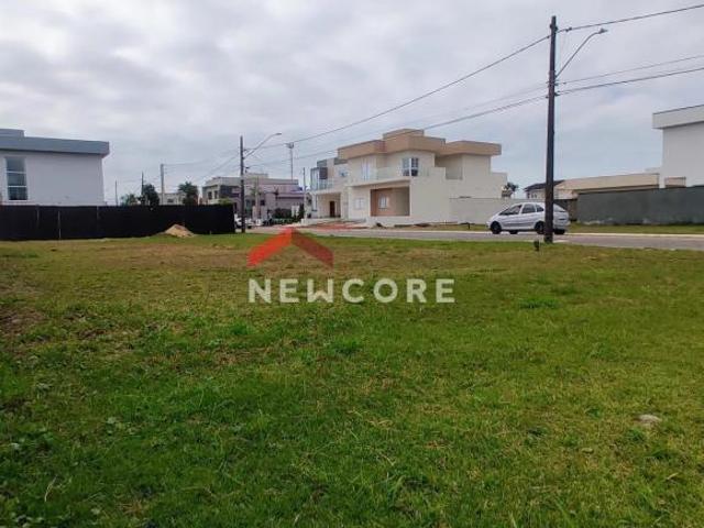 Lote em condomínio em Rua Carlos Gomes Jardim Ribamar Peruíbe/SP