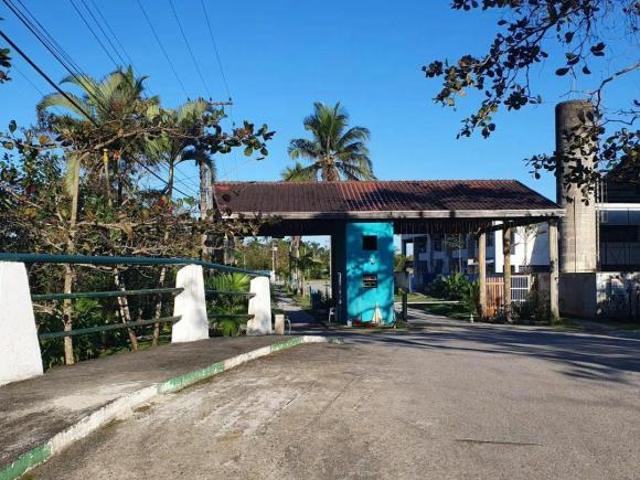 Lote em condomínio em Rua X Balneário Gardem Mar Caraguatatuba/SP