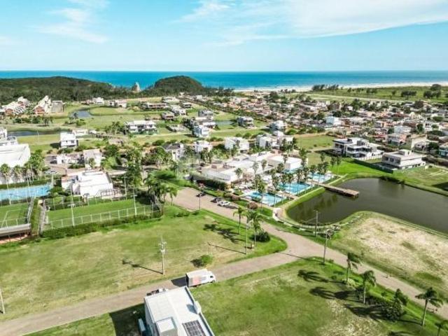 Lote fundos lago no Condomínio Ilhas Park em Torres RS