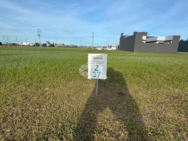 Lote 10,5 x 24 m com Frente Oeste no Bairro Planejado Santorini Xangri Lá/RS
