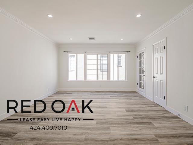 ~LOW DEPOSIT~ Gorgeous Two Bedroom with Spacious Open Floorplan, In Unit W/D Hookups, and Included Parking ~ In Prime Beverly Grove!