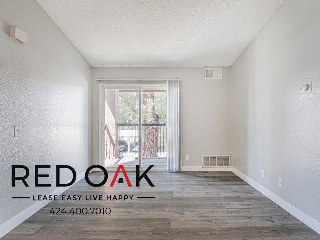 ~LOW DEPOSIT ~ SENIOR LIVING 55+~ Charming One Bedroom with Carpet, Balcony, Pool, On Site Laundry, and Included Parking ~ In the Heart of Hemet!