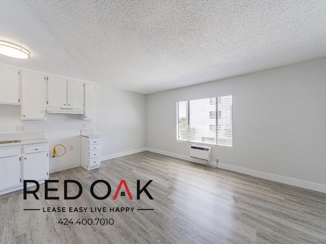 ~LOW DEPOSIT~ Spacious Two Bedroom with Air Conditioning and Two Included Parking Spaces ~ In Lovely Sylmar!