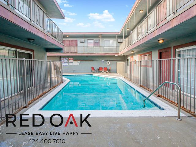 ~LOW DEPOSIT~ Spacious One Bedroom with Pool, On Site Laundry, and Included Parking ~ In Vibrant Van Nuys!