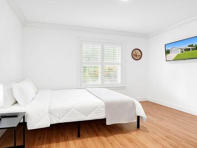 Low Move In fee! All Utilities Included! Free Fast Wi Fi ! Smart Lock Rooms! Plenty of Private Parking ! Affordable and Spacious Co Living Home in Port Saint Lucie