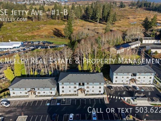 Lower level 2 bed/ 1 bath with 1 Assigned Parking Spot + Storage Room