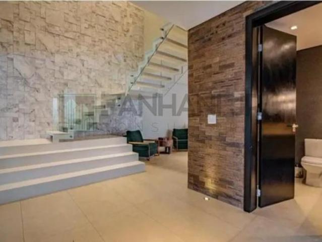 Luxuosa mansão de 4 quartos e 4 suítes no Jardim Europa, São Paulo SP: 5 salas, 6 banheiros, 4 vagas