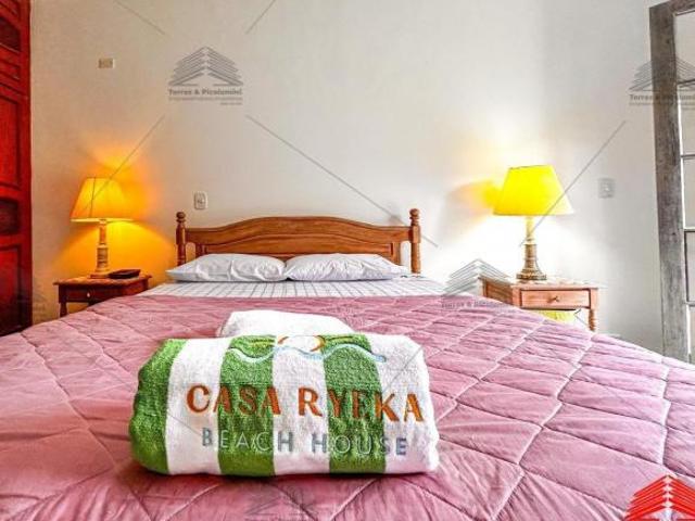 Luxuosa mansão de 7 quartos em condomínio no Jardim Acapulco, Guarujá SP: 6 suítes, 9 banheiros, 8 v
