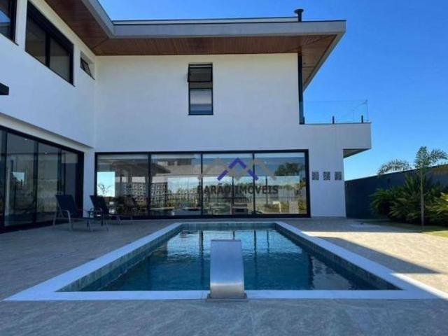 LUXUOSA CASA À VENDA DE ALTO PADRÃO NO CONDOMINIO TERRAS DA ALVORADA, COM VISTA PARA SERRA DO JAPI