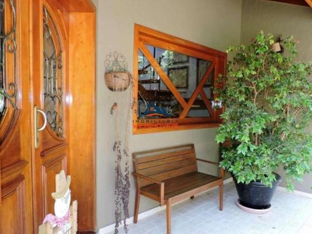 Luxuosa casa em condomínio à venda em Jandira SP, bairro Jardim do Golf I: 4 quartos, 2 suítes, 3 sa