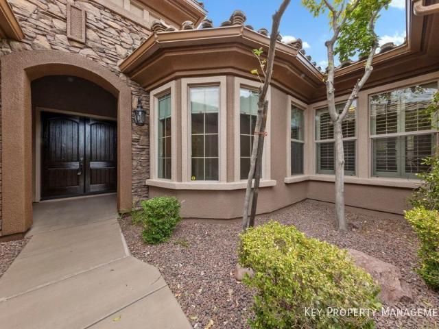 Luxurious Single Story Estate in Guard Gated Club at Madeira Canyon with Stunning Designer Finishes and Private Backyard Pool Retreat