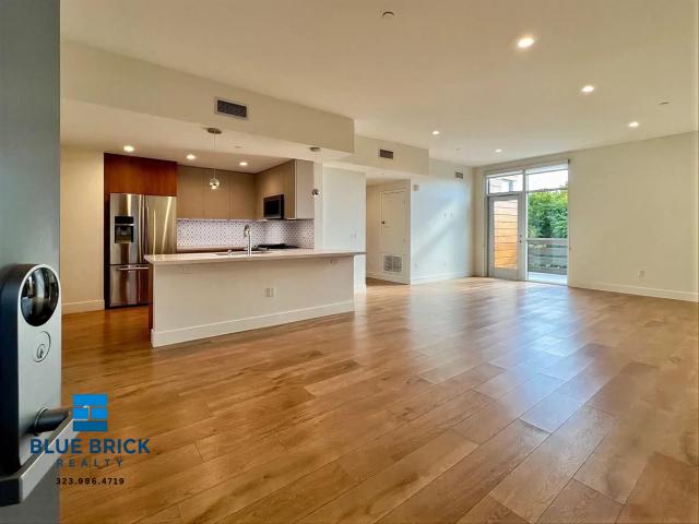 Luxury 2 Bedroom Residence with Rooftop Deck, Resort Style Pool & Modern Finishes