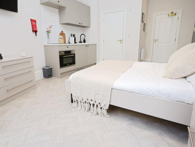 Luxury apartment with bills included moments from beach