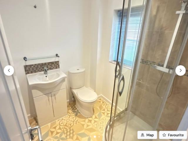 Luxury en suite bedroom with parking