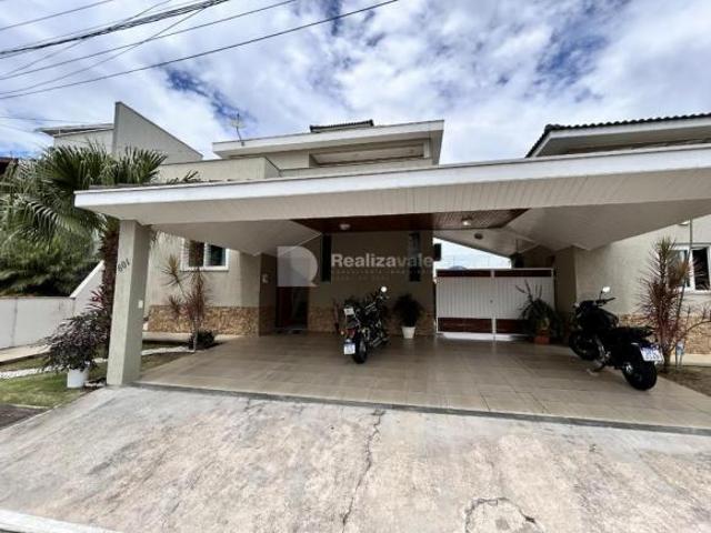 Mansão de 391m² no Jardim Oásis: 4 Suítes, Piscina de 15 Metros e Terreno de 500m²