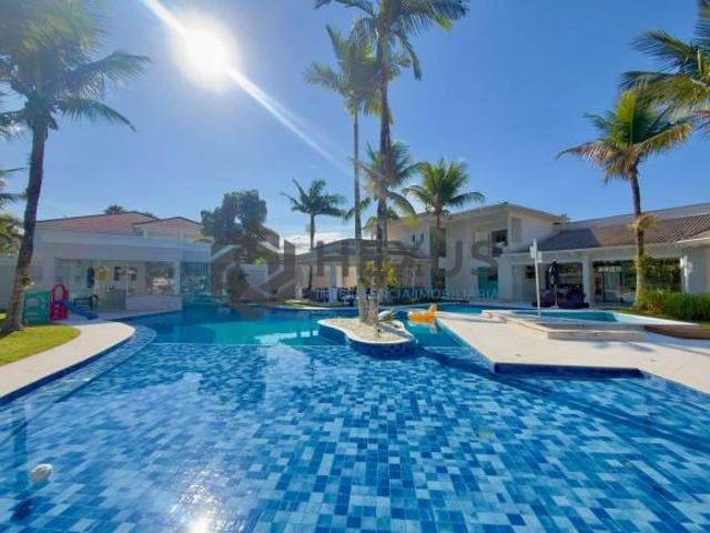 Mansão de alto padrão com piscina e área gourmet no Jardim Acapulco, Guarujá