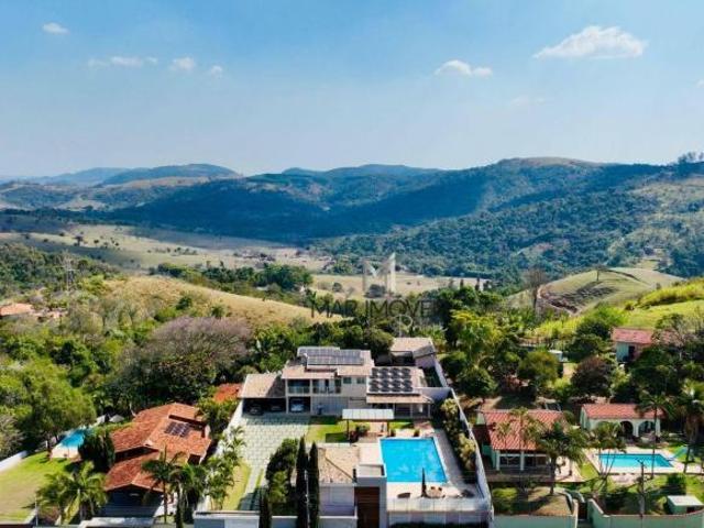 MANSÃO DE LUXO À VENDA EM AMPARO NO CIRCUITO DAS ÁGUAS | 711M², PISCINA AQUECIDA E VISTA PARA AS MON