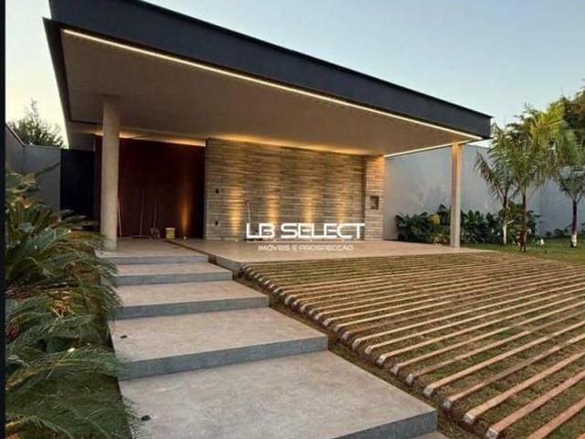 Mansão no Condomínio Gávea Hill com quatro suítes e varanda gourmet completa