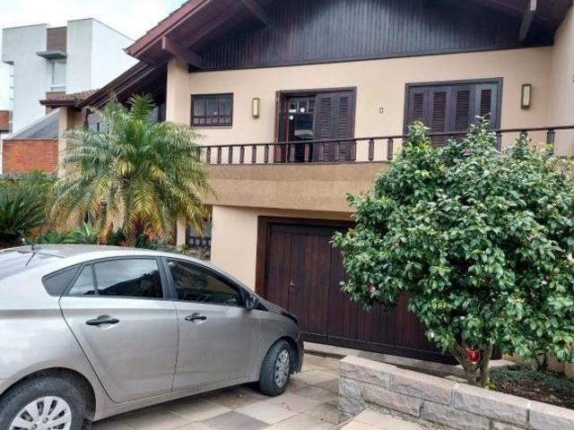 MAGUINÍFICA CASA EM CONDOMÍNIO COM VISTA PERPÉTUA PARA O GUAÍBA NONOAI