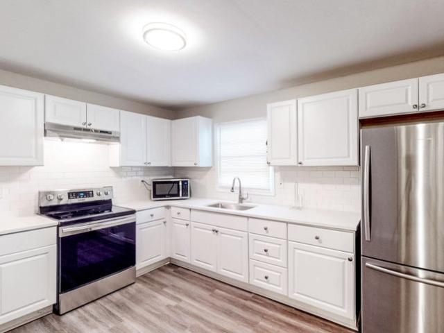 Make yourself at home in this Renovated Brick Home
