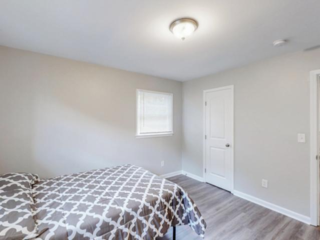 Make yourself at home in this Renovated Brick Home, a 10 min walk to bus stop Browns Mill Rd & Mt Zion Rd
