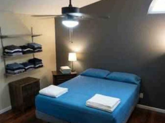 Master Bedroom Utilities+Xfinity 70 TV & Dresser