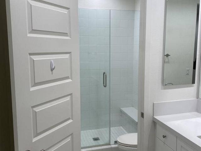 Master bedroom w/ ensuite bathroom