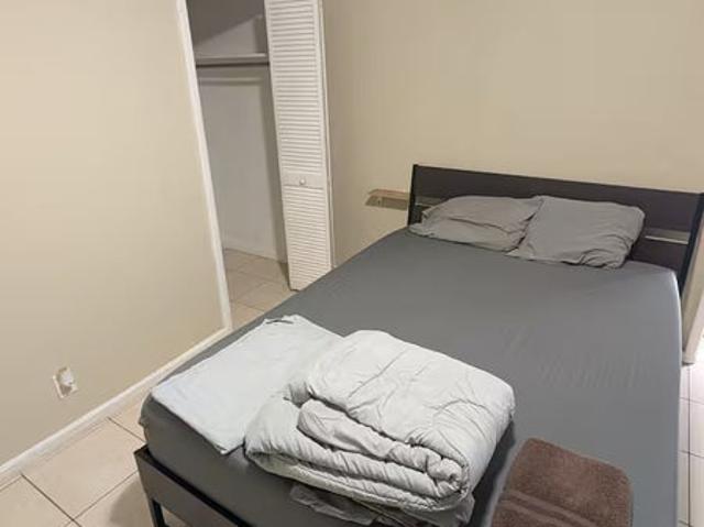 Master bedroom with a private bathroom
