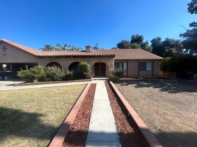 Master Bedroom with bathroom & access to backyard