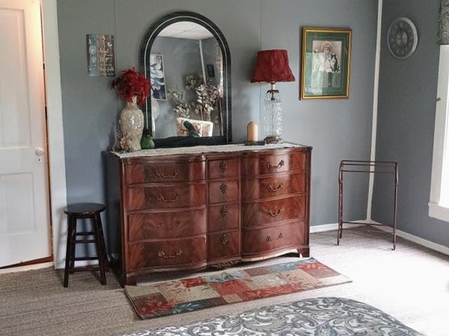 Master bedroom furnished in country home