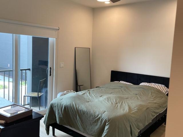 Master Bedroom in Upscale Condo Near Downtown