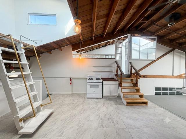Massive 1,820 Sq. Ft. Industrial Loft | Skylights, Mezzanine & Gated Parking Included