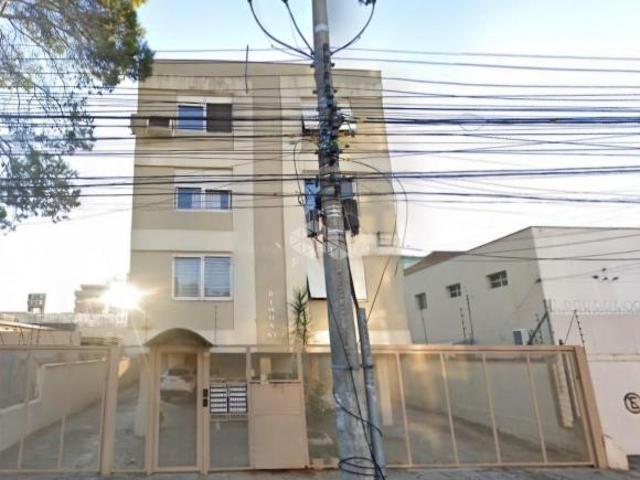 Menino Deus Apartamento reformado com 2 dormitórios, 1vg. e baixo custo condominial!