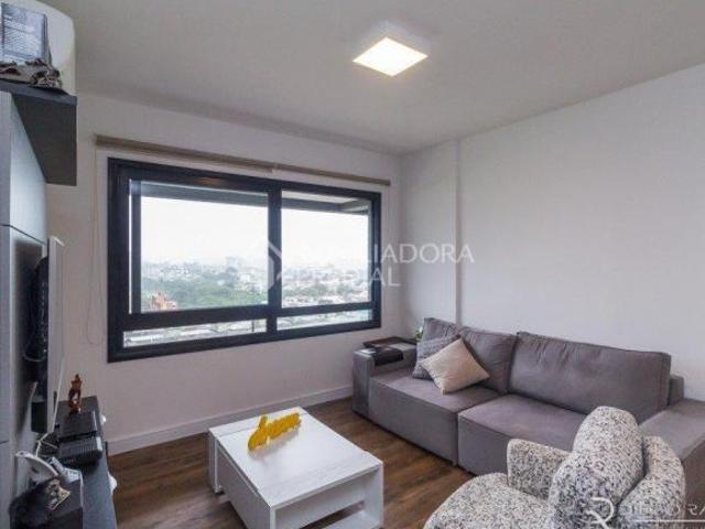 Apartamento mobiliado com 1 quarto e 2 vagas à venda no bairro Jardim Botânico em Porto Alegre