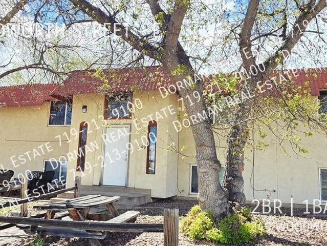Monument 2 Bedroom, 1 Bath Unit with New Paint and Carpets!