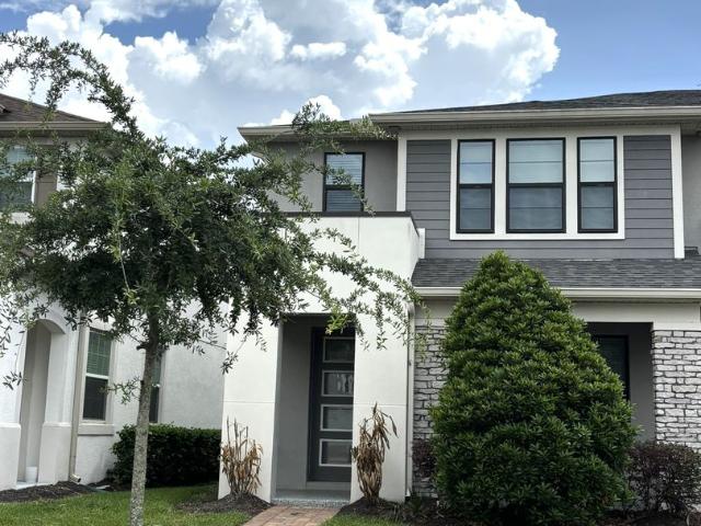 Modern 3/2.5 Townhouse located in the Tapestry Community of Kissimmee