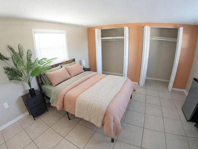 Modern Co Living in Tampa | Free Utilities & Fast Wi Fi | Close to Transit, Shopping, & More! | Security System |Secure, Private Furnished Rooms | Private Parking