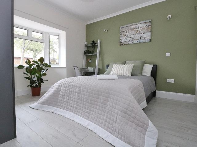 Modern double bedroom near East Acton metro station Has a Room