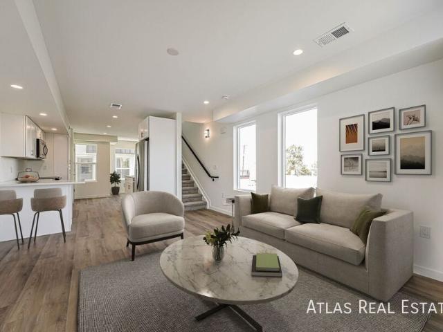 Modern Four Level New Build Townhomes with Multiple Patios and Stunning Views! 1 MONTH FREE! Rent includes water, sewer, and trash