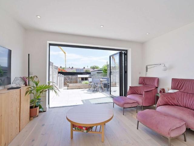 Modern family living at its finest, with a bespoke kitchen, spacious principal suite, and landscaped garden