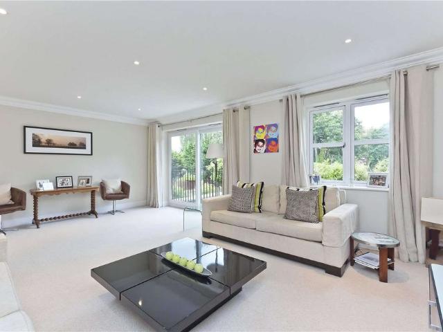Modern five bedroom townhouse conveniently located within half a mile of Queens Road amenities