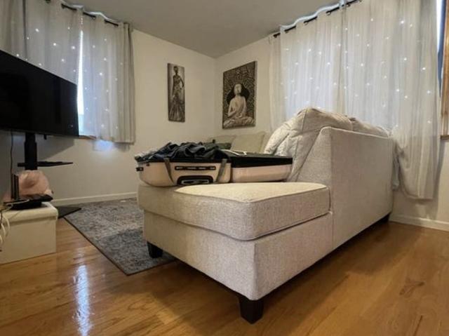 Modern Furnished Condo Room with Rooftop City View